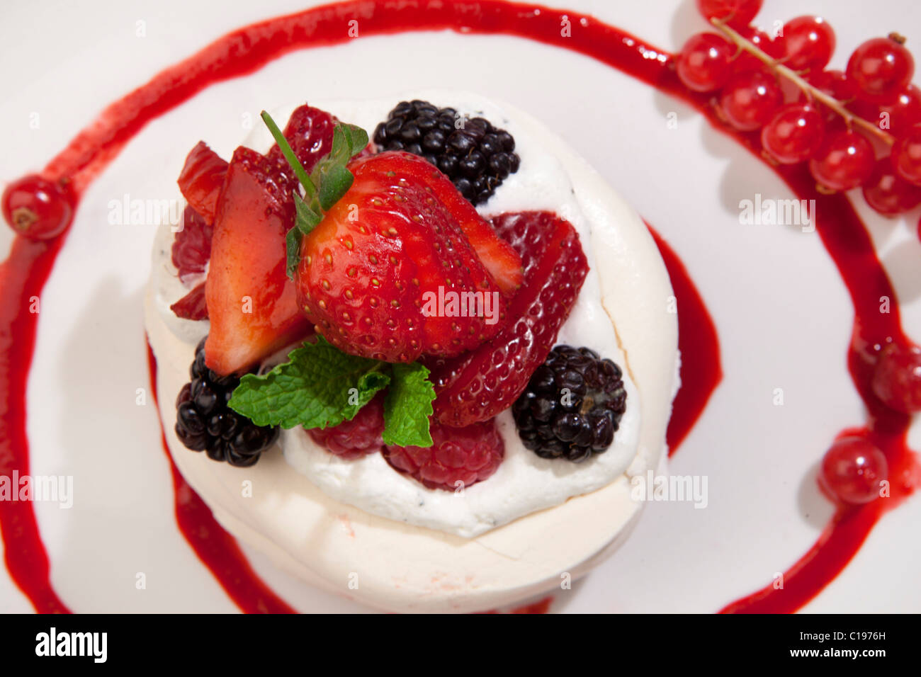 Dessert sweet pudding Red berry Pavlova ginger & mint with mixed berry ...
