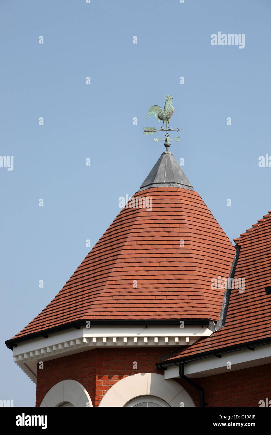 Red tiled turret on corner of building Stock Photo - Alamy