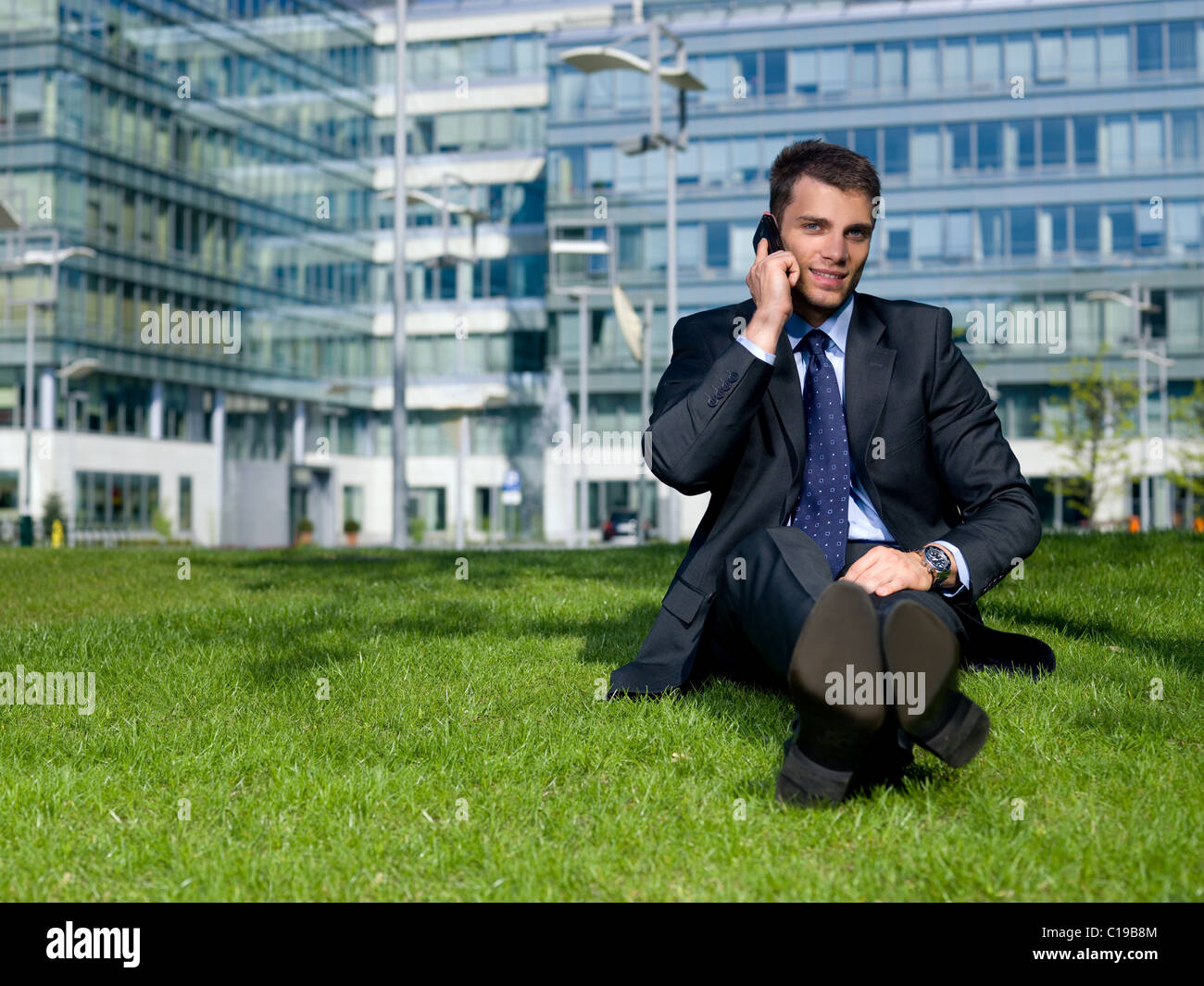 Portrait of business man outside the building Stock Photo - Alamy