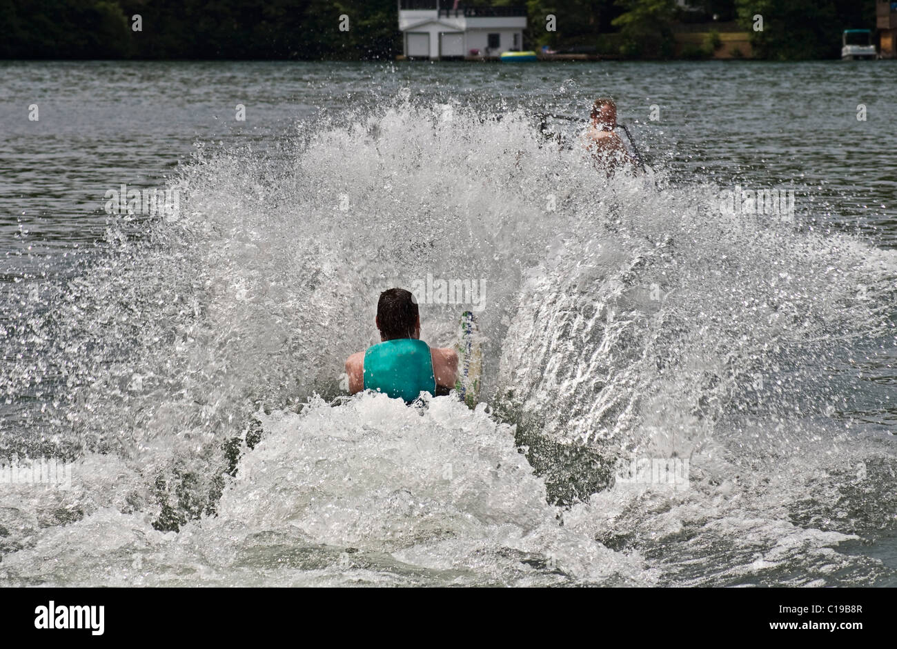 Man water skiing behind boat hi-res stock photography and images - Alamy