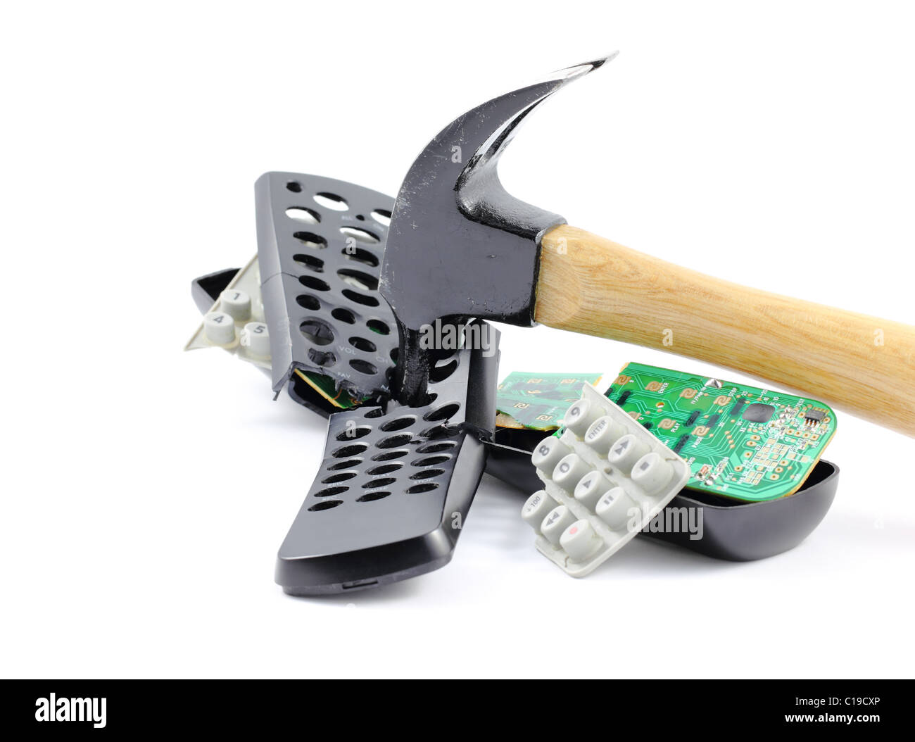 A hammer smashing a television remote control, isolated on a white ...