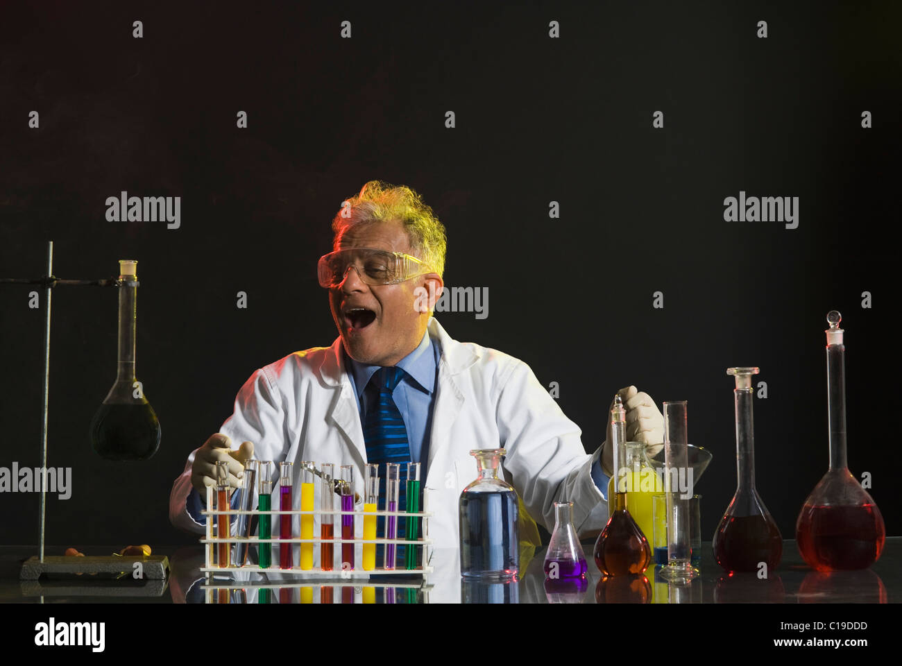 Scientist doing scientific experiment in a laboratory Stock Photo - Alamy