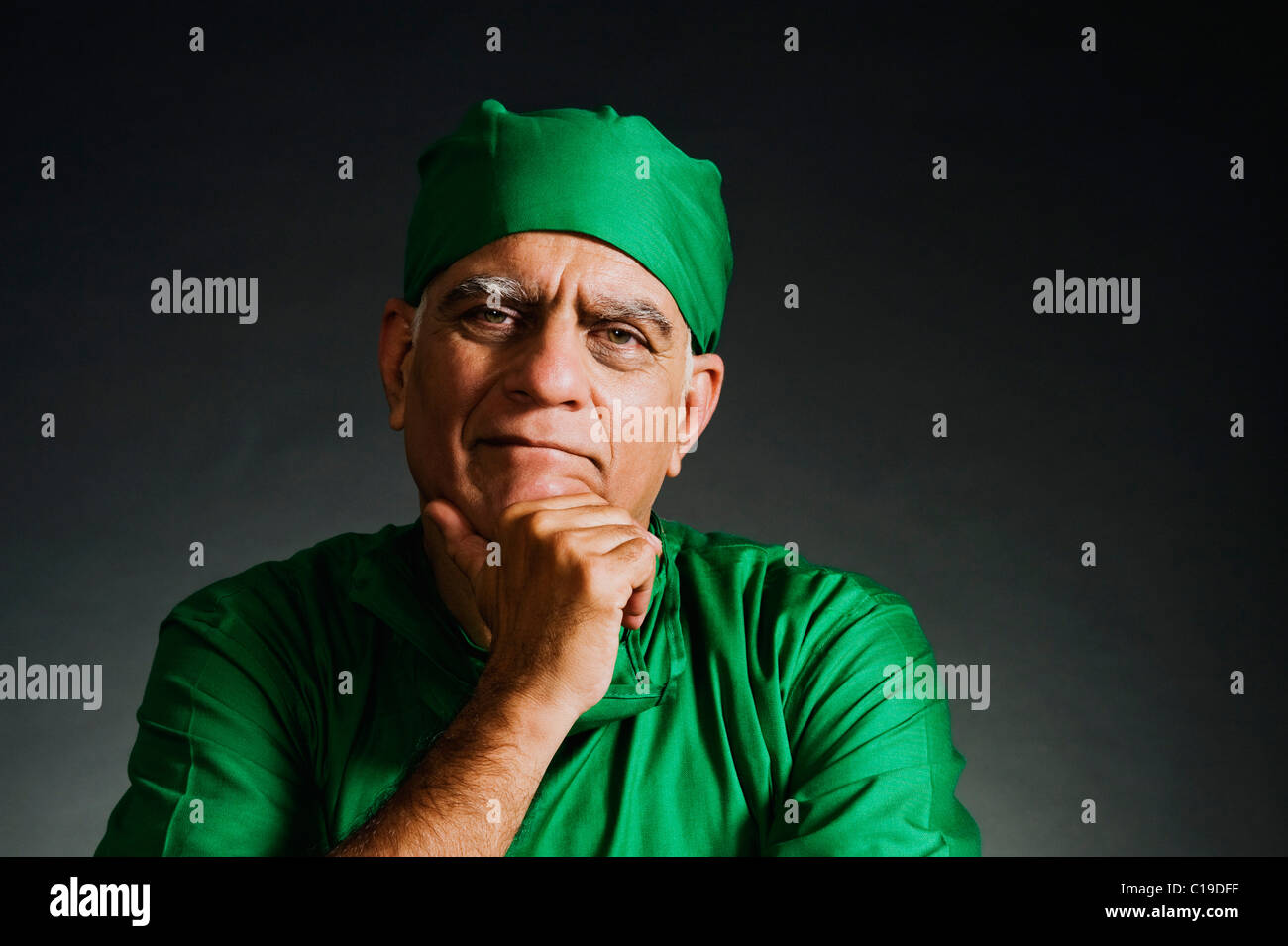 Portrait of a surgeon thinking Stock Photo - Alamy