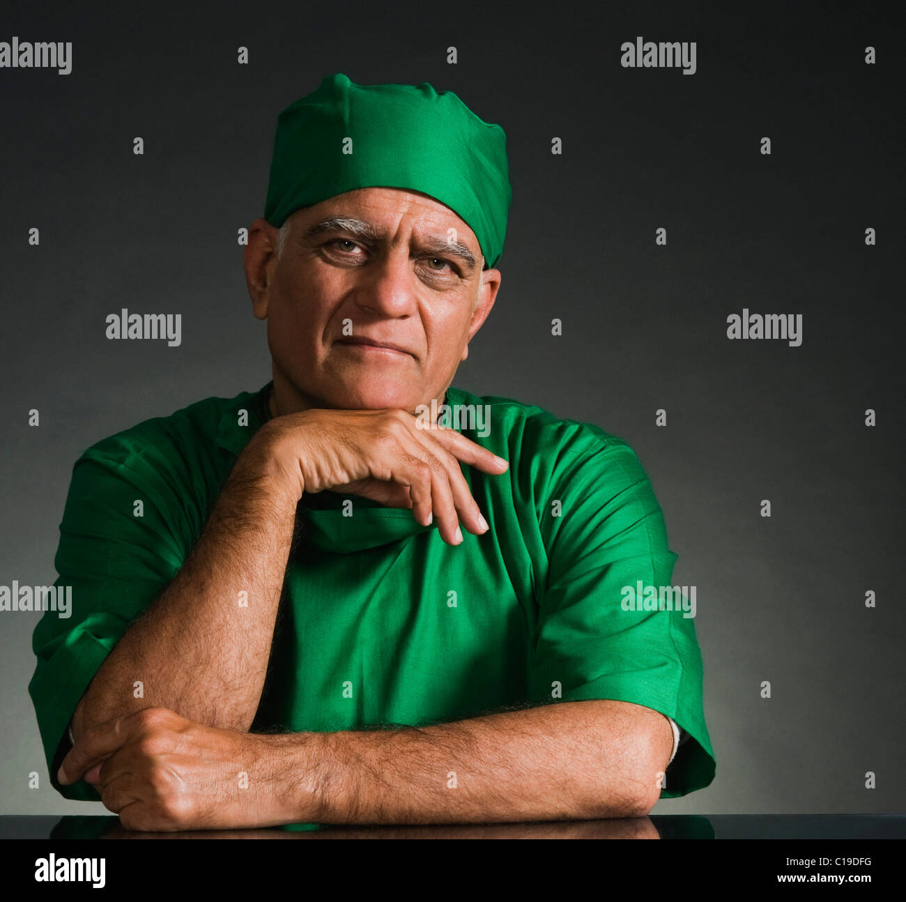 Portrait of a surgeon thinking Stock Photo - Alamy