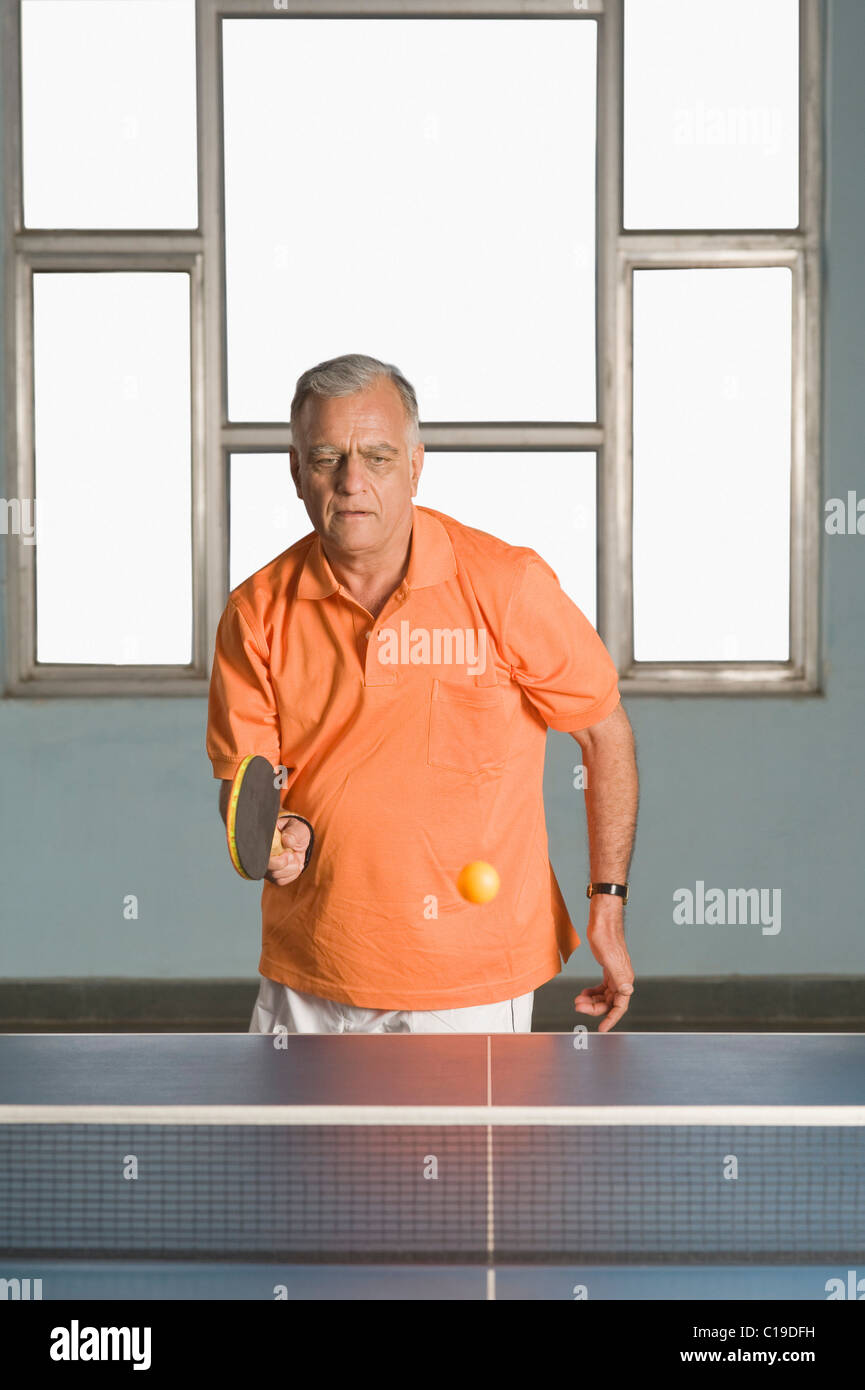 Man playing table tennis Stock Photo - Alamy