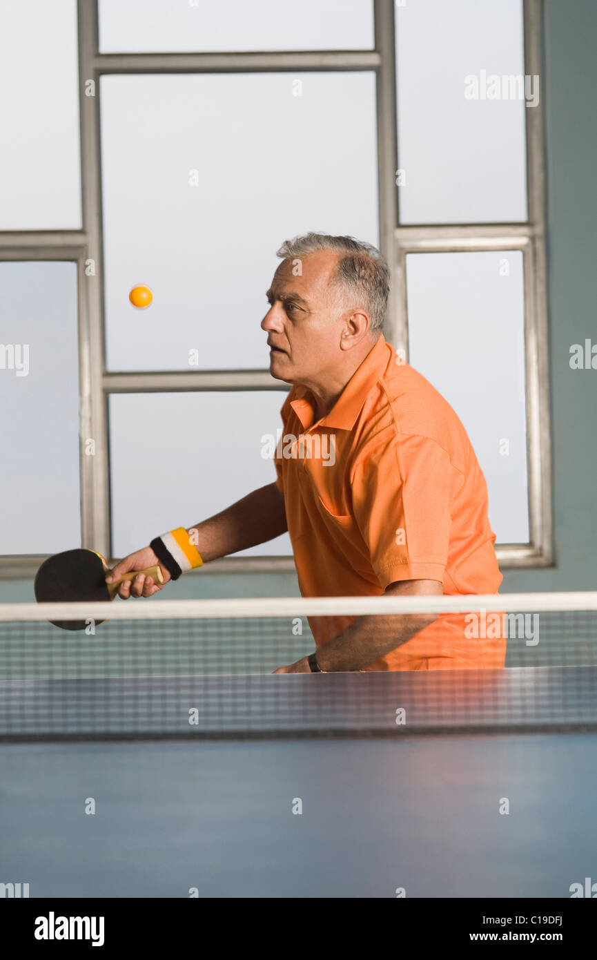 Man playing table tennis Stock Photo - Alamy