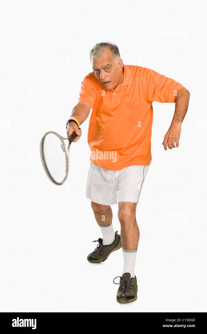 Man playing tennis Stock Photo - Alamy