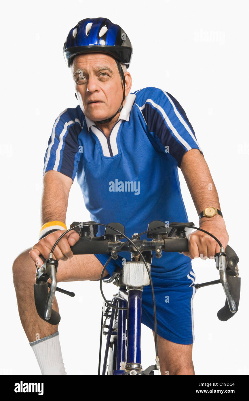 Man riding a bicycle Stock Photo - Alamy