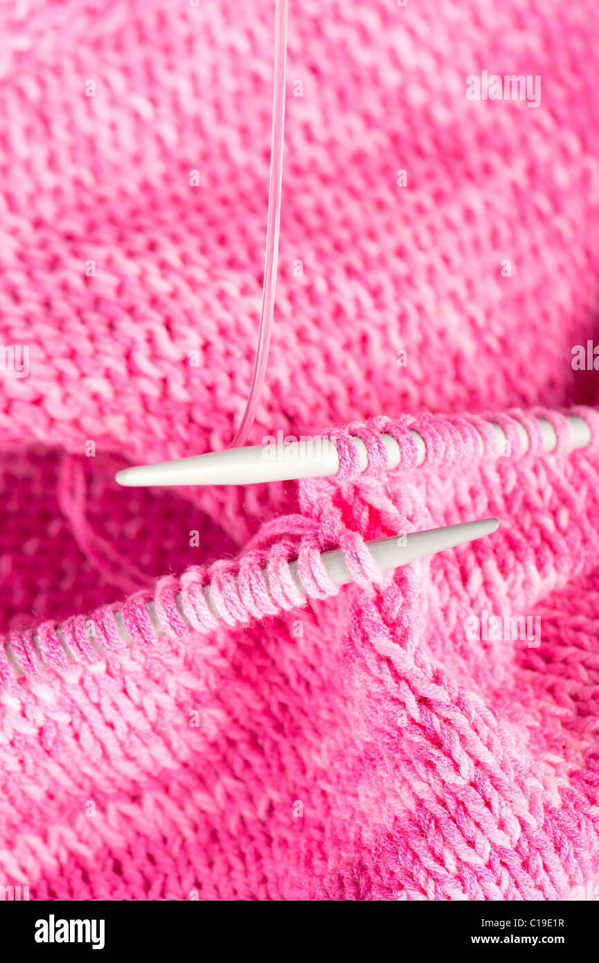 Handmade needle knitted pink canvas background Stock Photo - Alamy