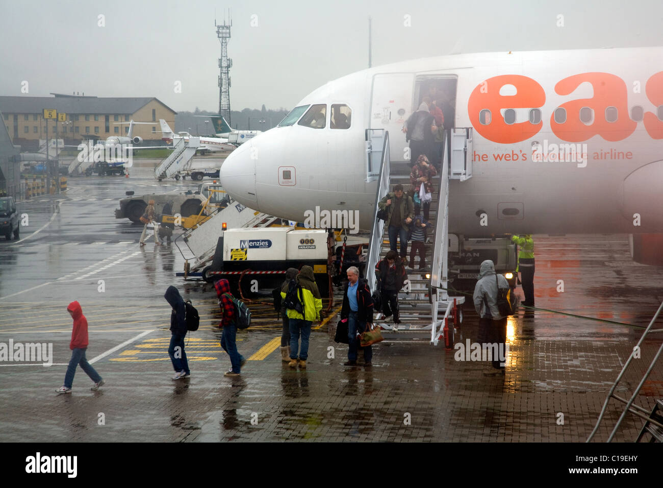 Easy Jet air plane on rainy Sunday at Luton airport Stock Photo - Alamy
