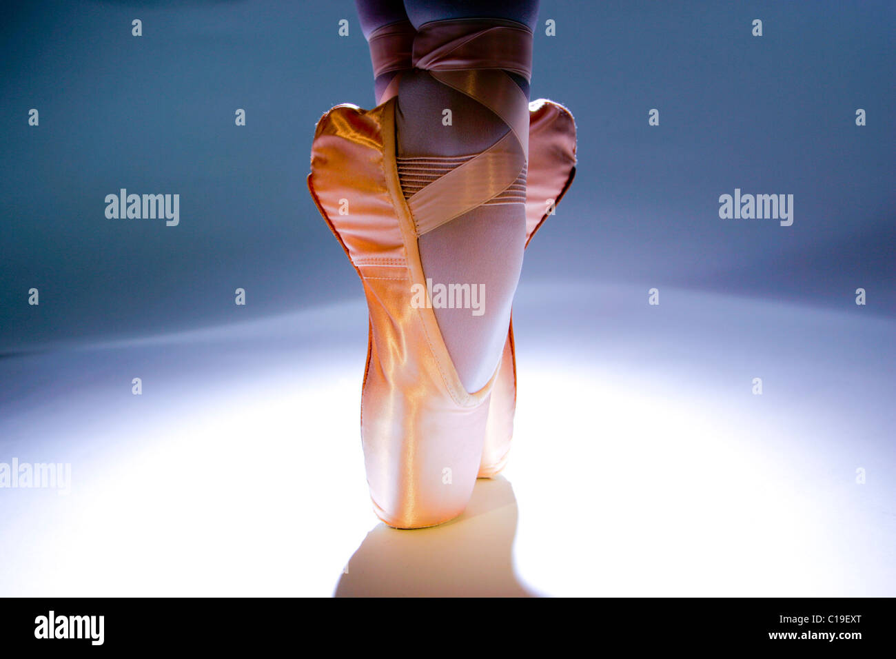 Ballet dancer holding a tight 5th position en pointe Stock Photo - Alamy