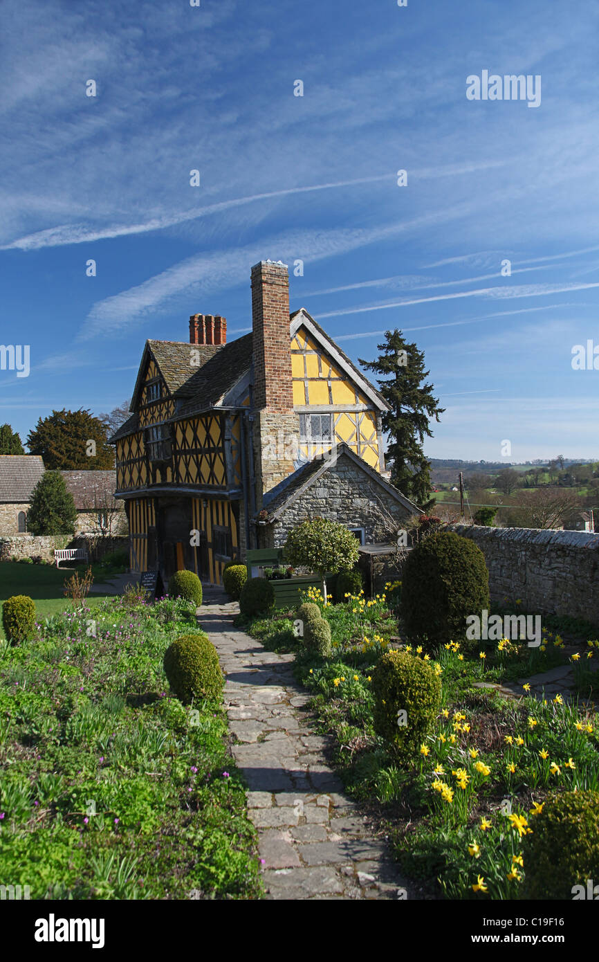 The colorful half-timbered gatehouse at the entrance to Stokesay Castle ...