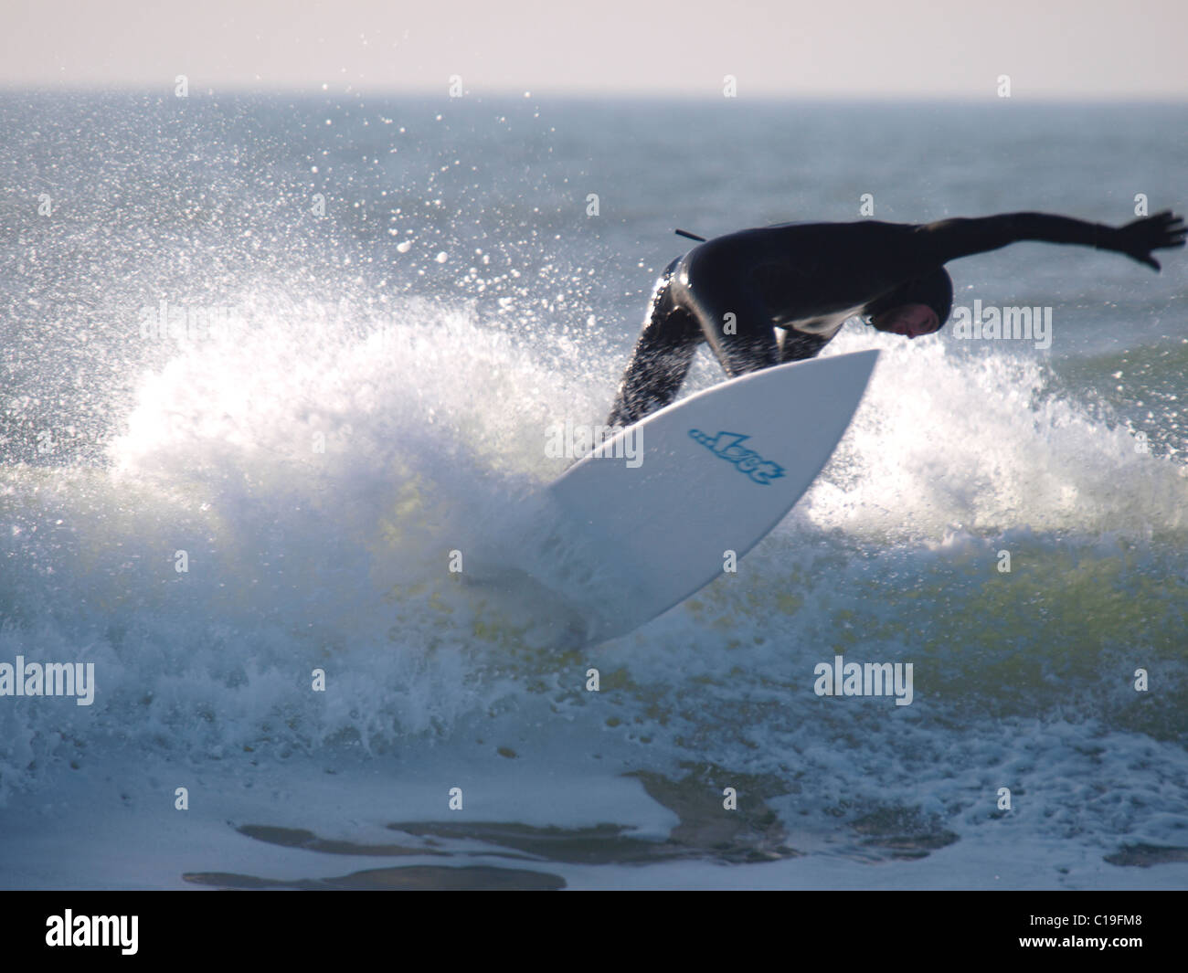 Wetsuit surfing cornwall hi-res stock photography and images - Alamy