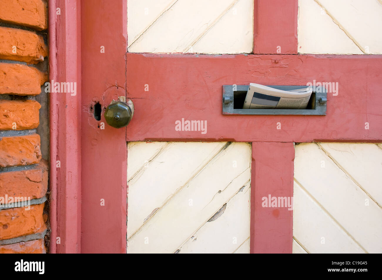Morning newspaper in the letter hole Stock Photo - Alamy