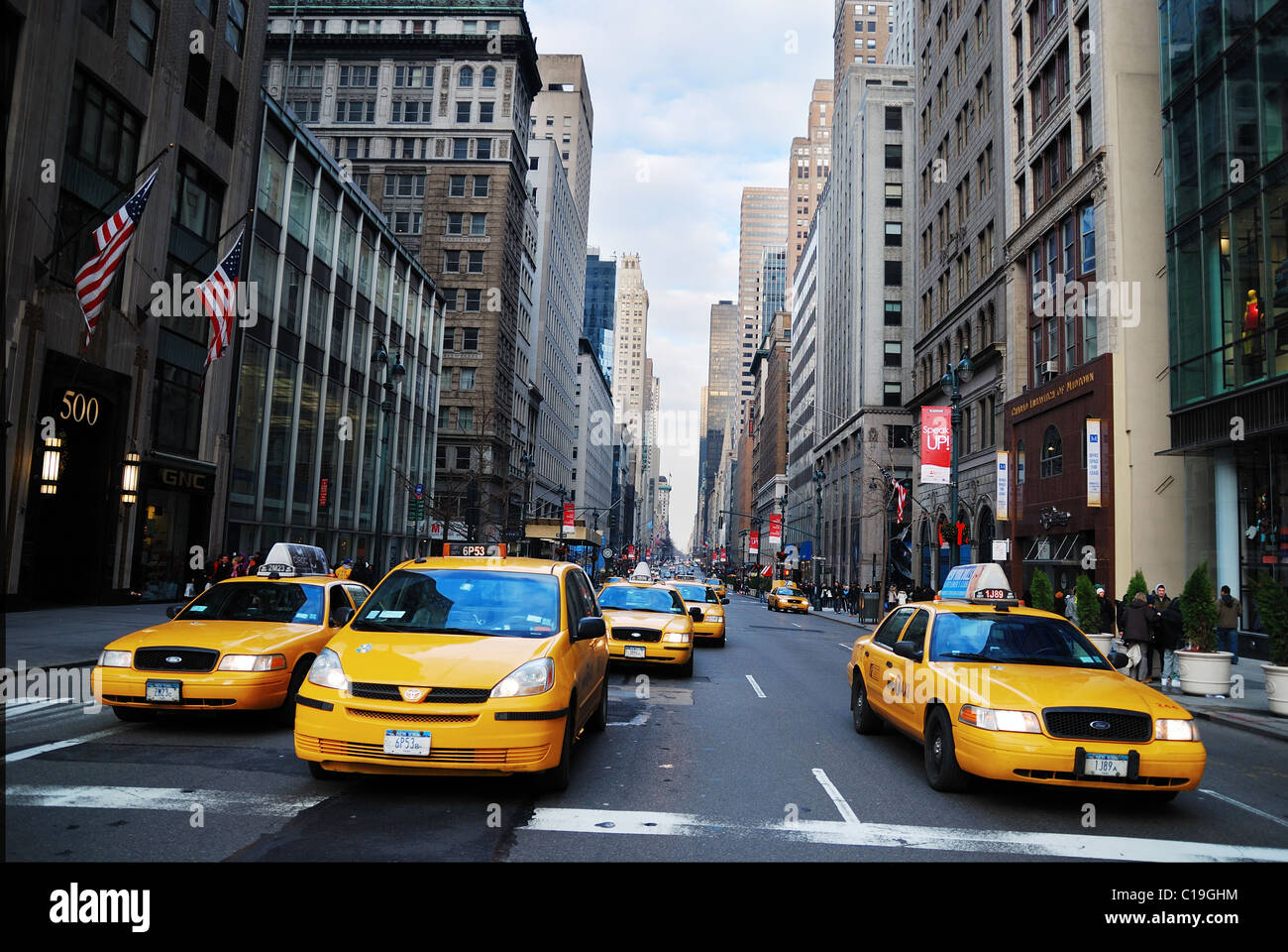 The taxicabs of New York City Manhattan, with their distinctive yellow ...
