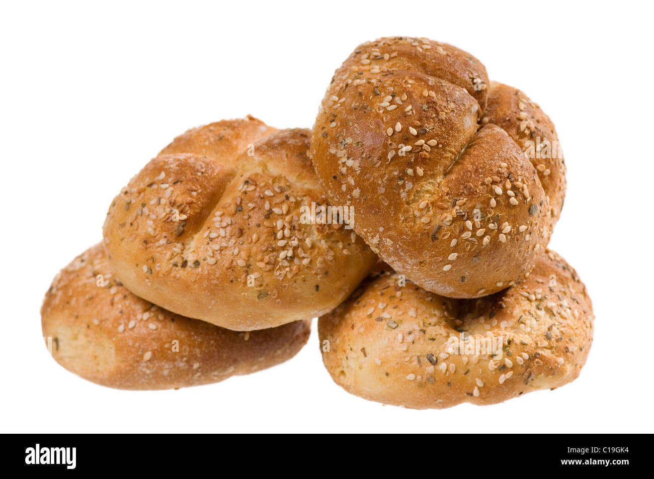 baked graham kaiser rolls with spices and sesame Stock Photo - Alamy