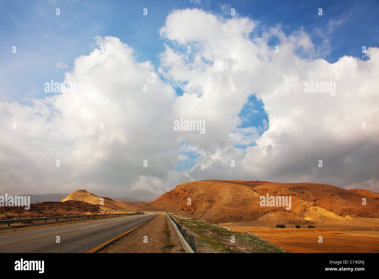 Highway in desert Stock Photo - Alamy