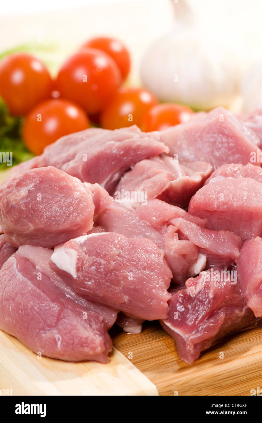 Group of raw red pork meat pieces for stew Stock Photo - Alamy