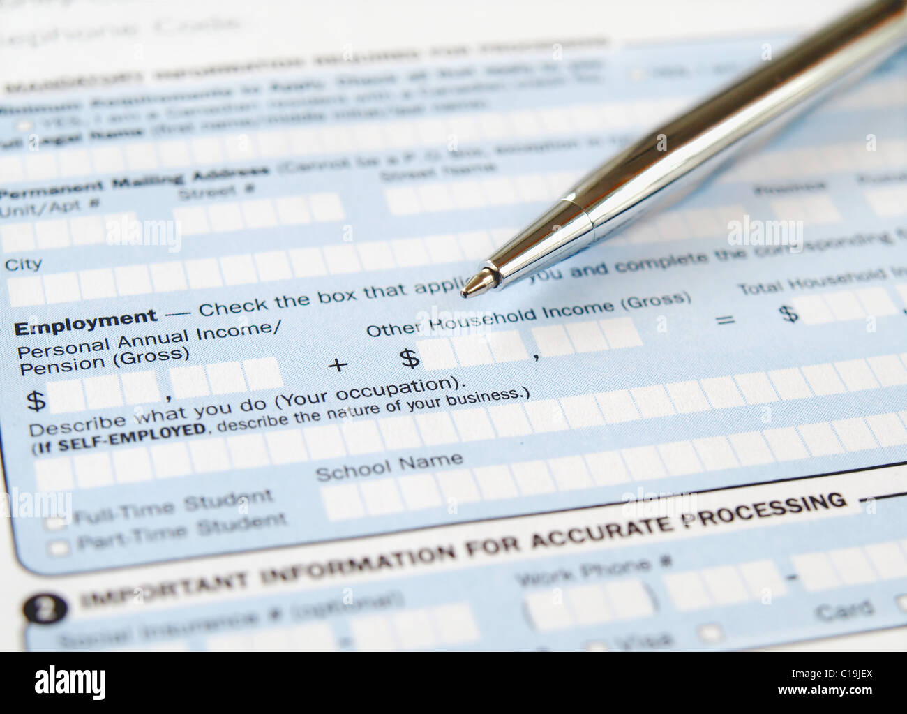 Close up of the pen on the application form Stock Photo - Alamy