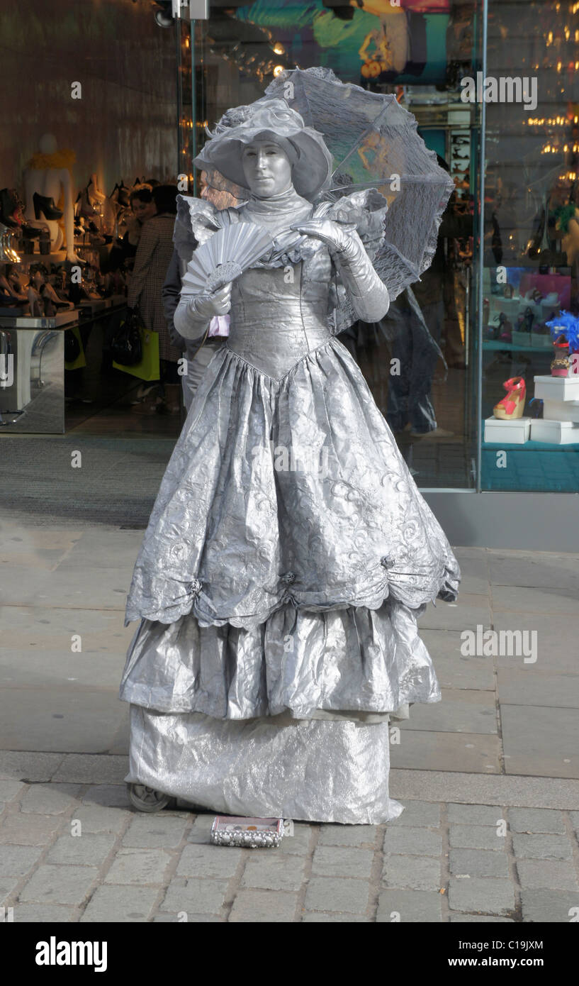Beautiful victorian lady human statue all in silver hi-res stock ...