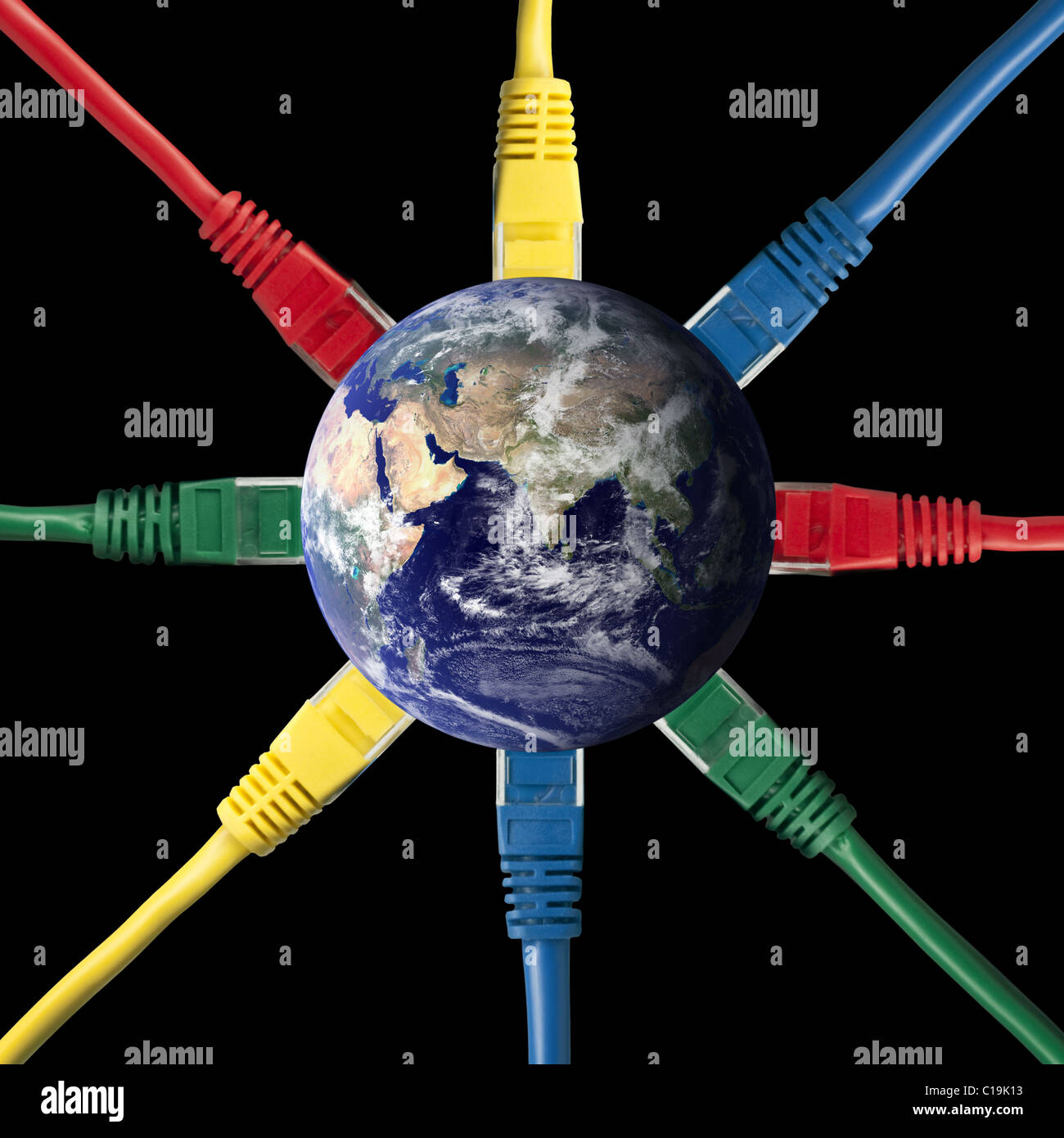 Colored network cables attached to the earth sphere isolated on black ...