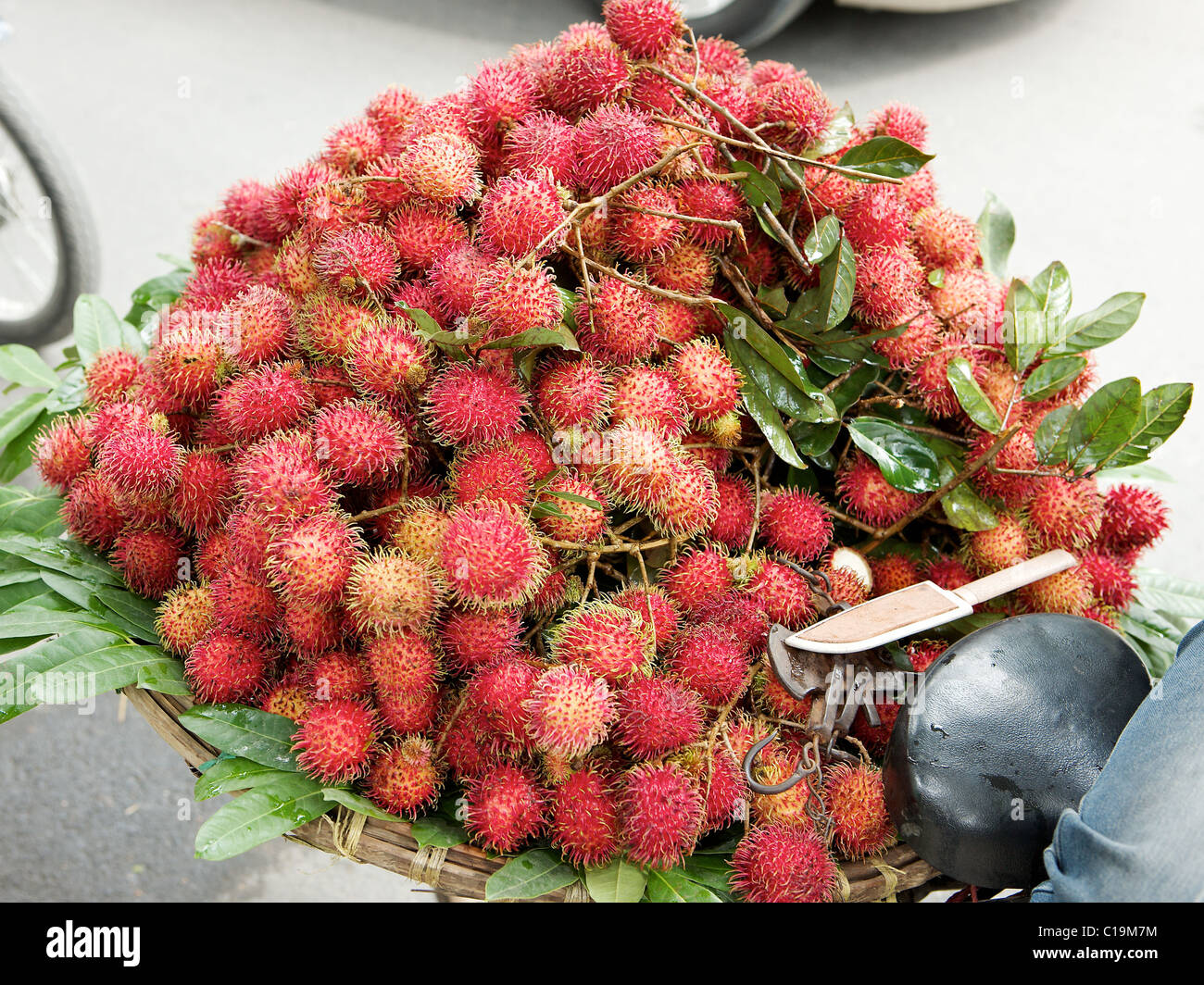 Fresh lychees for sale on the streets of Hanoi, Vietnam Stock Photo - Alamy