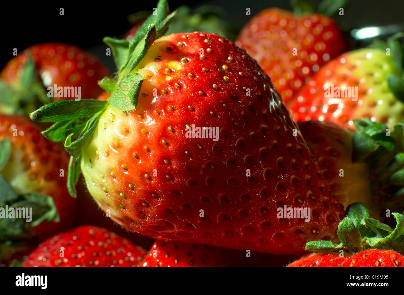 A bunch of ripe, red strawberries ready to be eaten! Stock Photo - Alamy