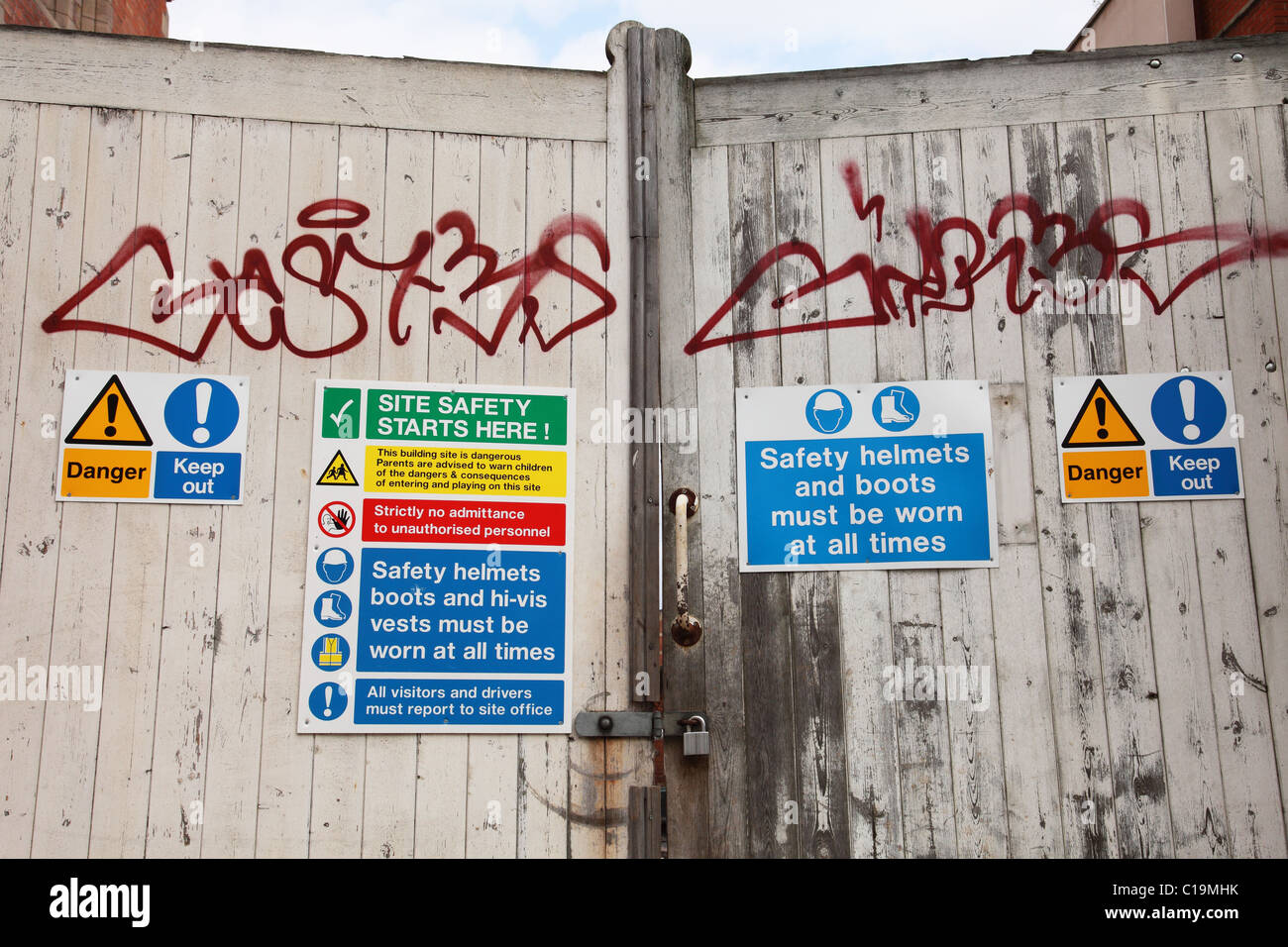Health & Safety warning signs on a builders yard in a U.K. city Stock ...