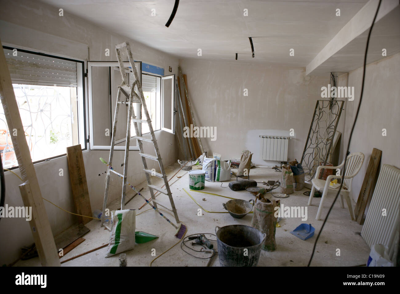 messy room during construction improvement, tools and materials Stock ...