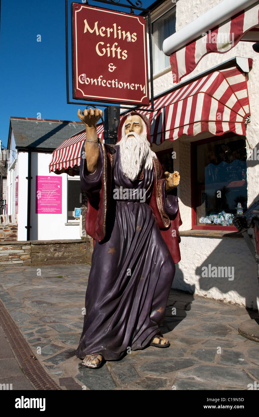 A statue of " Merlin " outside a gift shop at Tintagel in Cornwall, UK ...