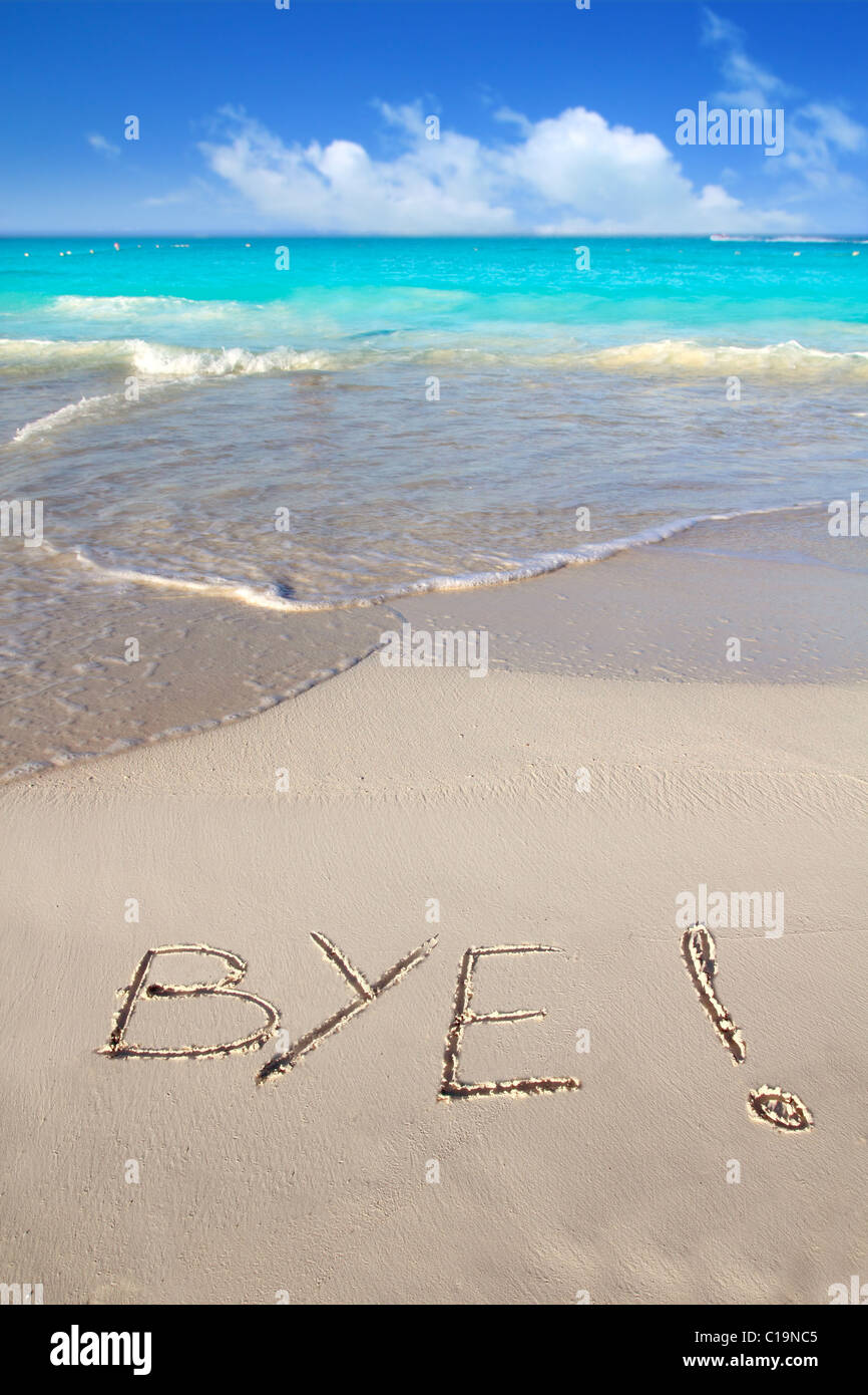 Bye spell written in beach sand tropical Caribbean end of vacation ...
