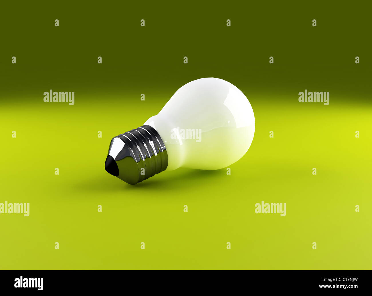 Single light bulb on green background Stock Photo - Alamy