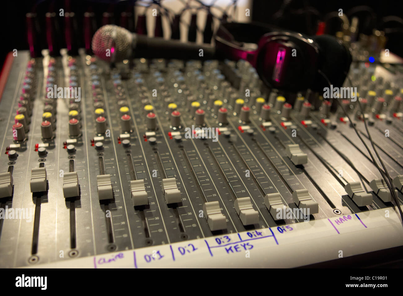 audio mixing desk with labelled sliders in a theatre concert hall Stock ...