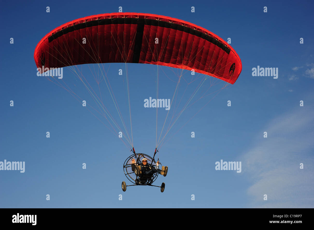 Red paraglider wings hi-res stock photography and images - Alamy