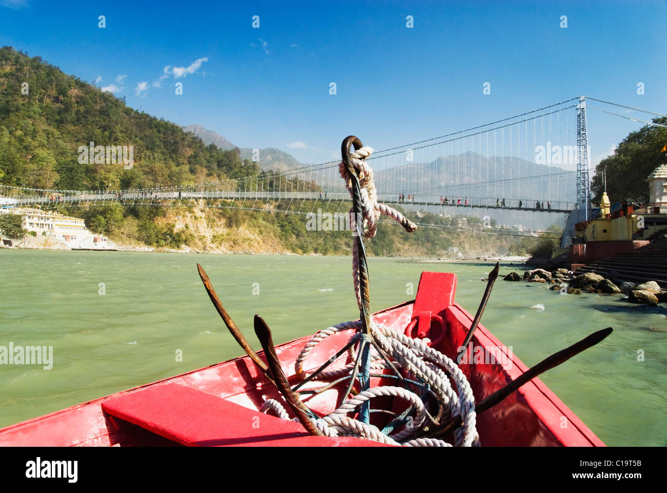 Suspension bridge across a river, Ram Jhula, Ganges River, Rishikesh ...