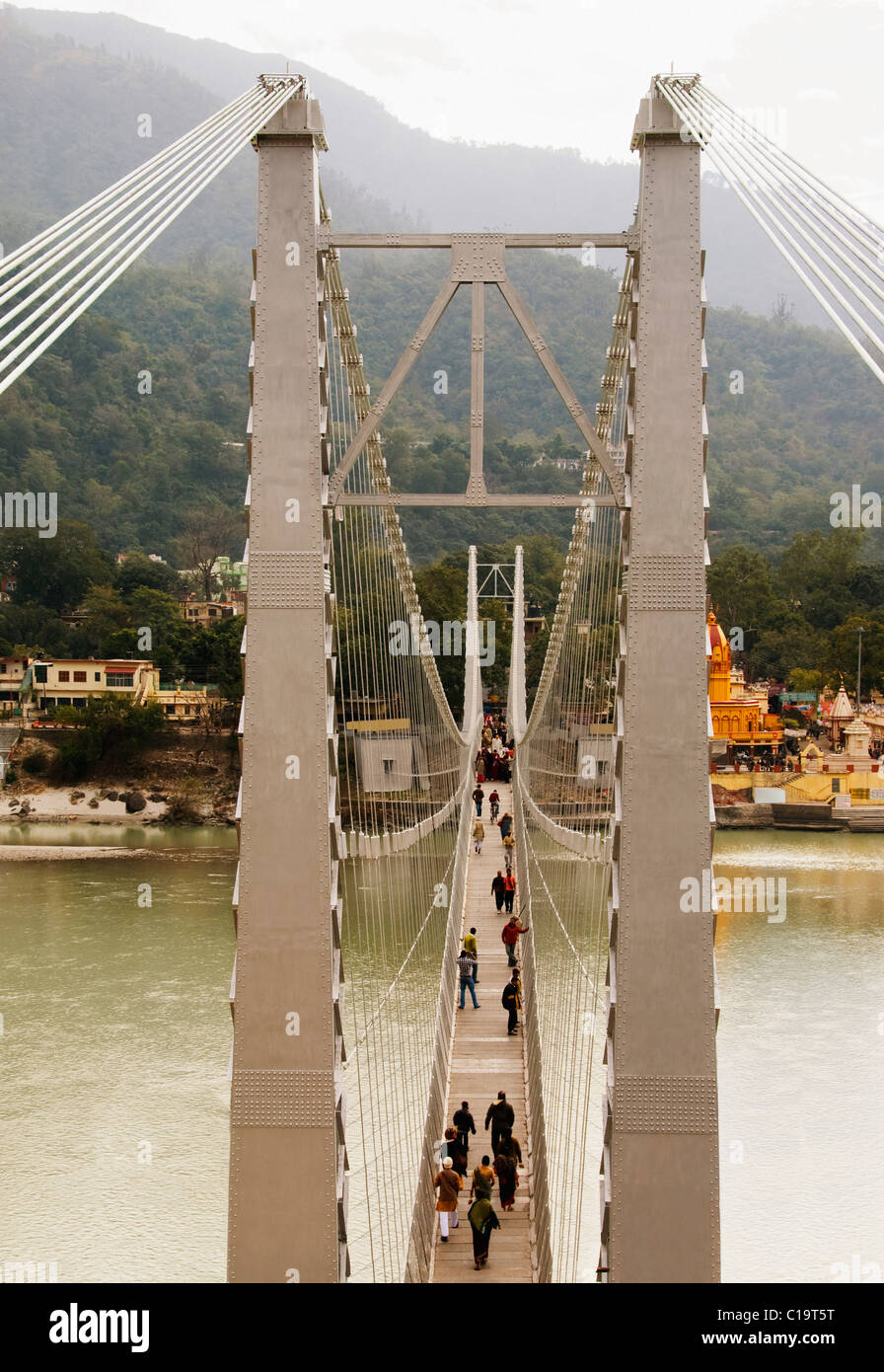 Suspension bridge across a river, Ram Jhula, Ganges River, Rishikesh ...
