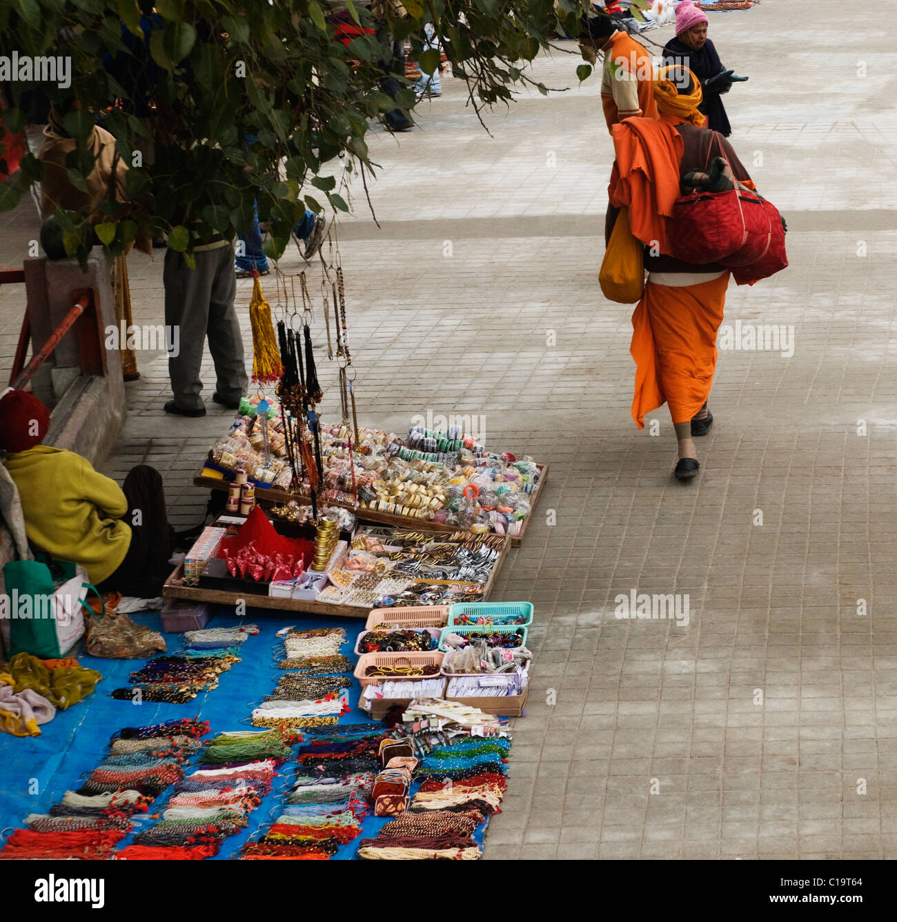 Vendor selling beads at a street market, Haridwar, Uttarakhand, India ...