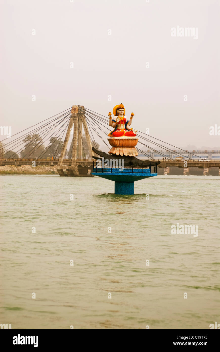 Goddess Ganga statue in a river, Ganges River, Haridwar, Uttarakhand ...