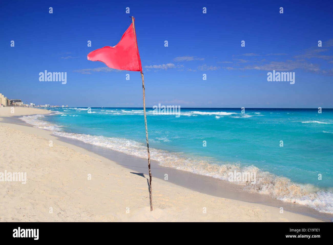 dangerous red flag in beach with rough sea signal Stock Photo - Alamy