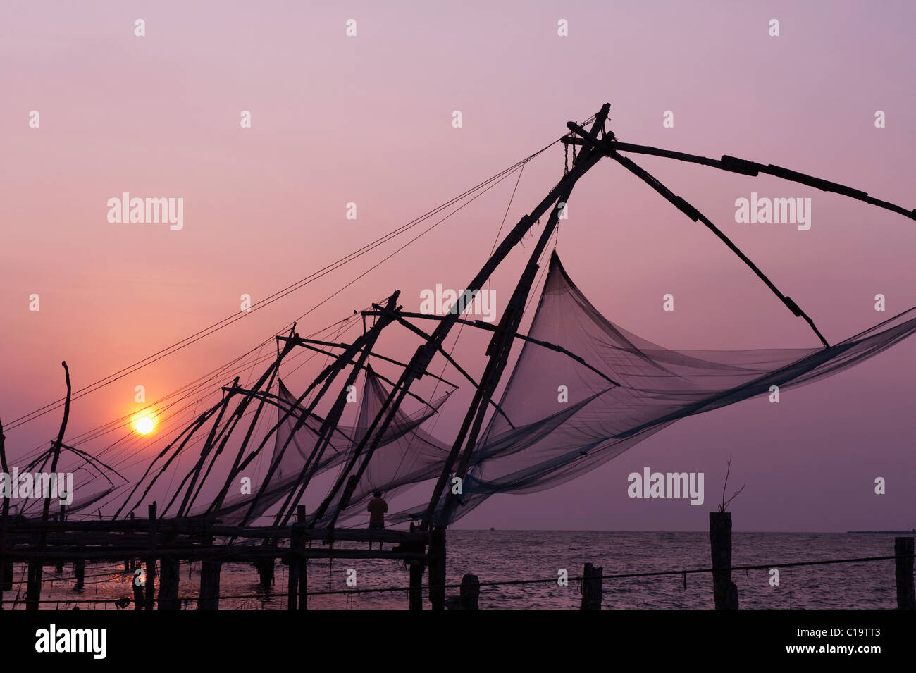 Row of Chinese fishing nets in the sea, Kochi, Kerala, India Stock ...