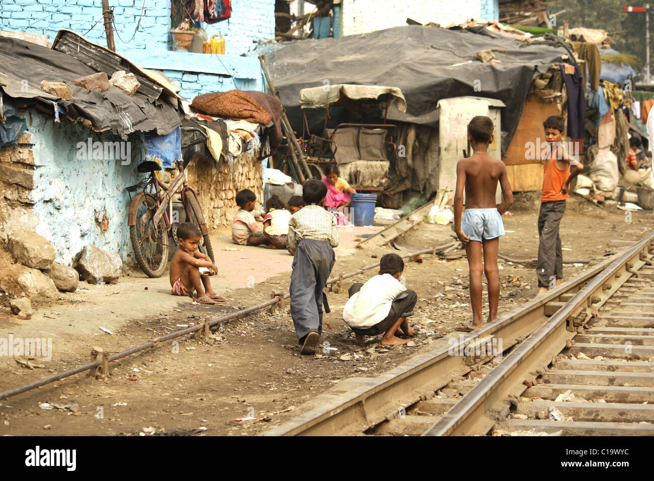Slum boys playing in the Delhi Cant area of New Delhi, India Stock ...