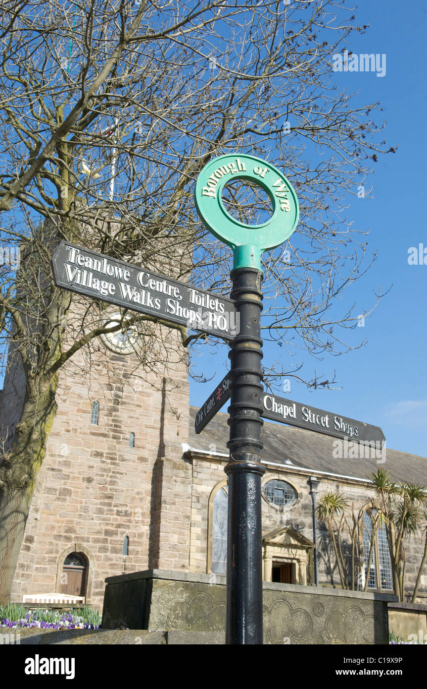 Sign pointing direction to town centre amenities Stock Photo - Alamy