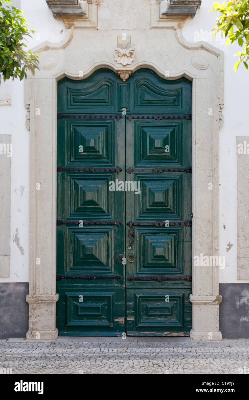 View of an old and green convent/monastery door Stock Photo - Alamy