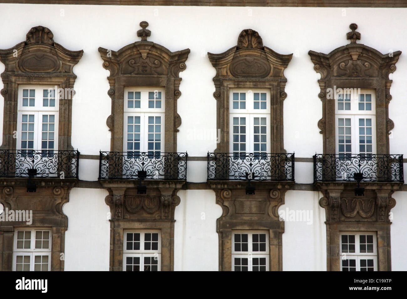 View of an aligned row of classic ornamented building windows Stock ...