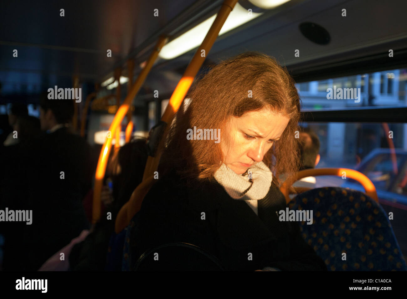 Woman on london bus hi-res stock photography and images - Alamy