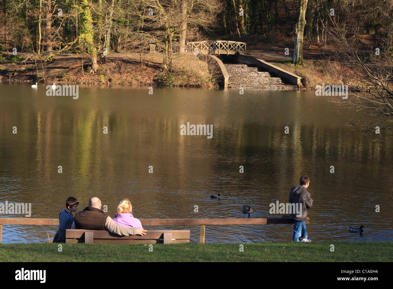 Family day out at Gnoll Country Park, Neath, overlooking Great Pond and ...
