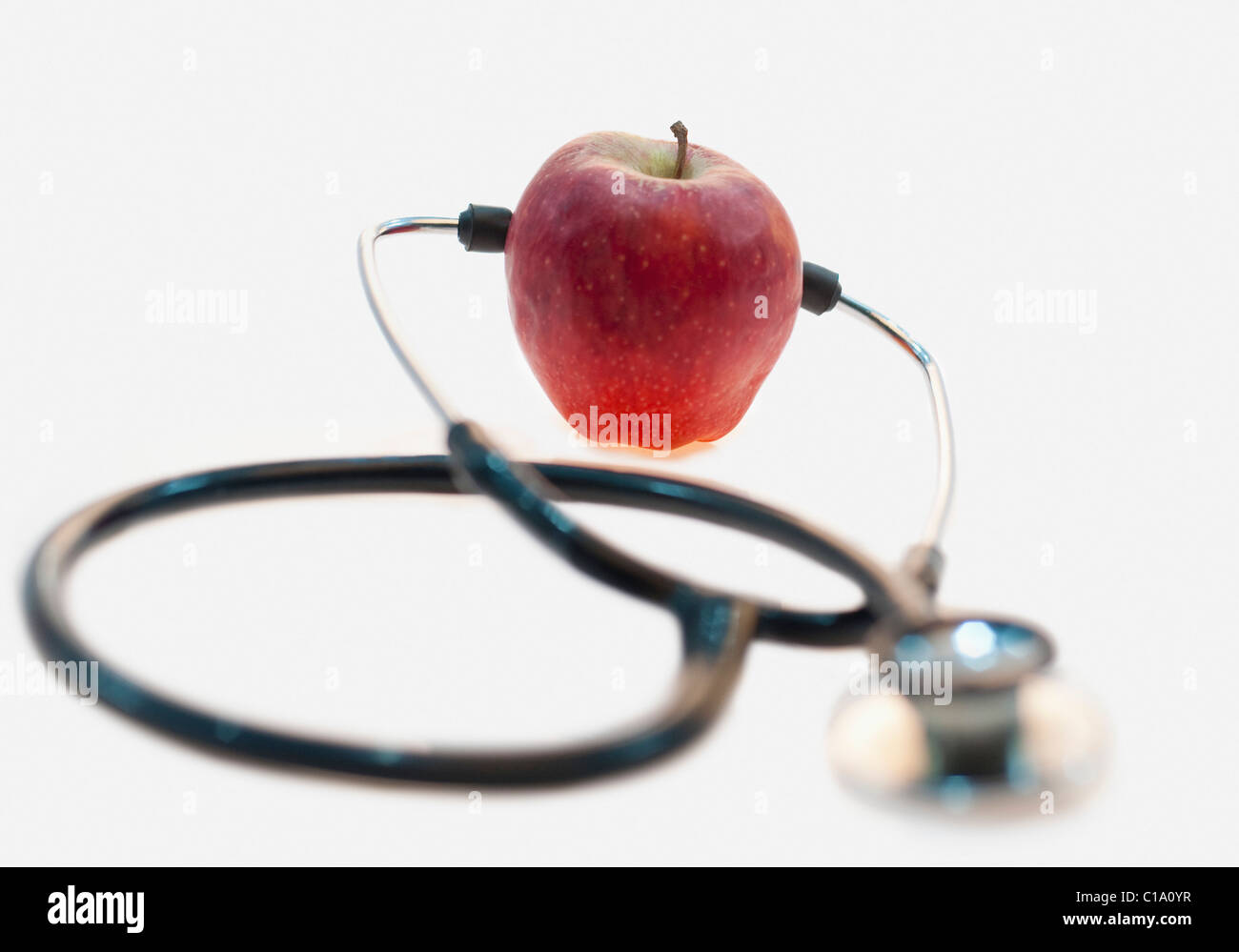Close-up of a stethoscope on an apple Stock Photo - Alamy