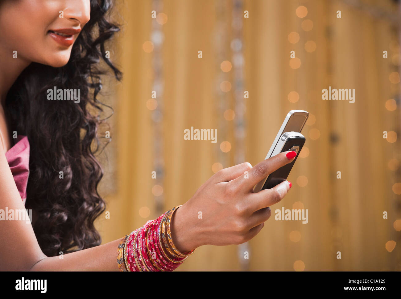 Bengali woman mobile phone hi-res stock photography and images - Alamy