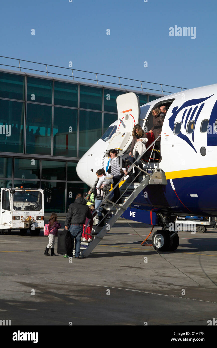 PASSENGERS OF RYANAIR PLANE ARRIVING AT STANSTED AIRPORT Stock Photo ...