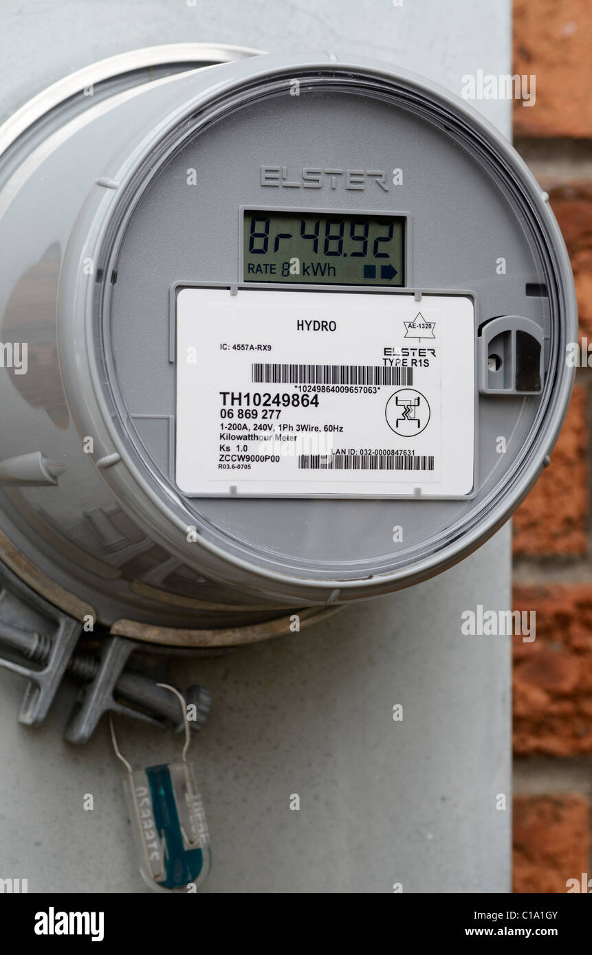 Hyrdro electrical Smart Meter retrofit outside a brick house Stock ...